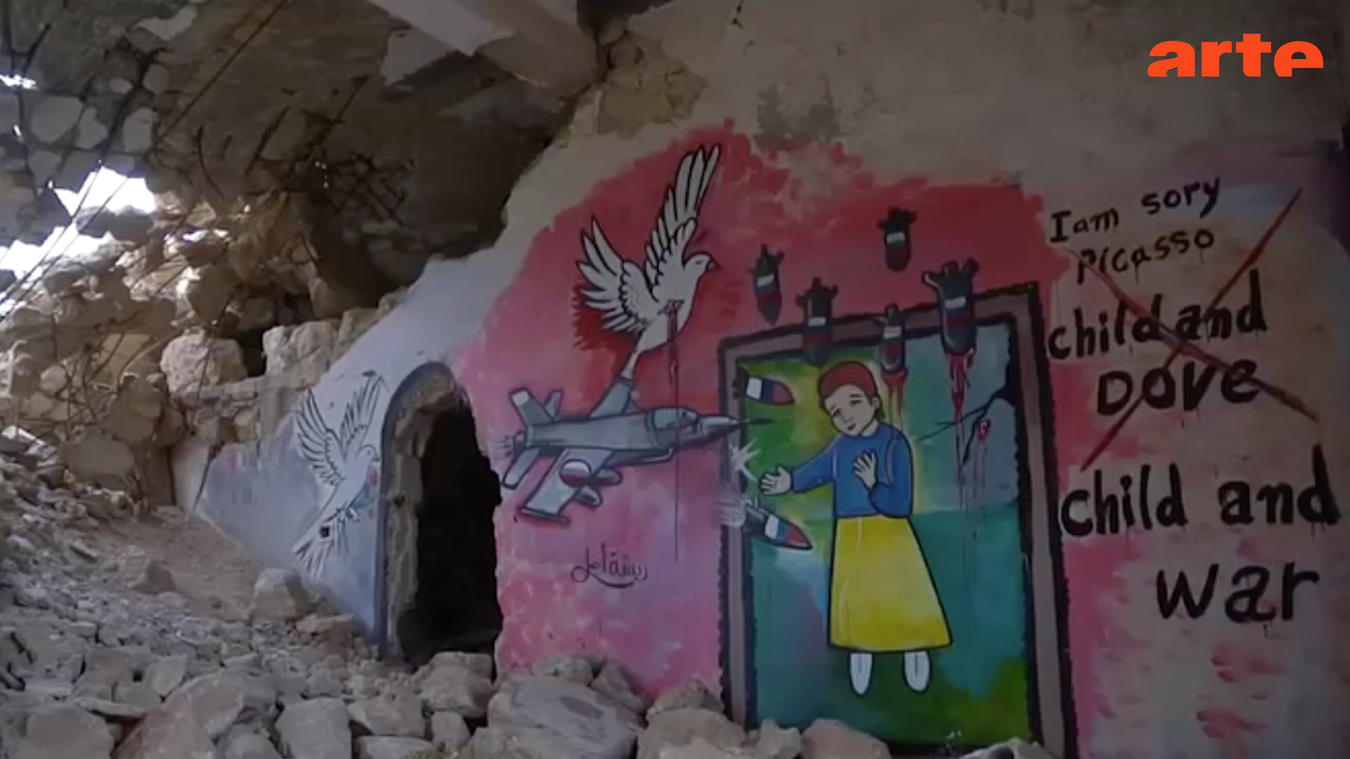 Syrie : peindre les murs des maisons en ruine - Regarder le ...